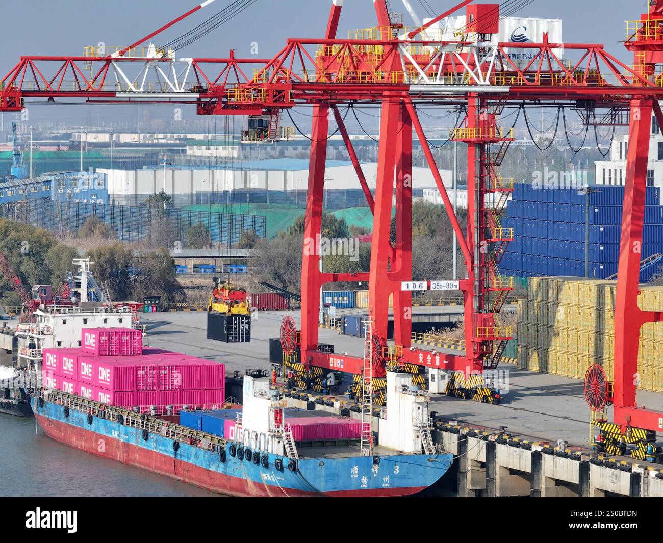 Aerial photo shows the busy container terminal at Yangzhou Port in ...