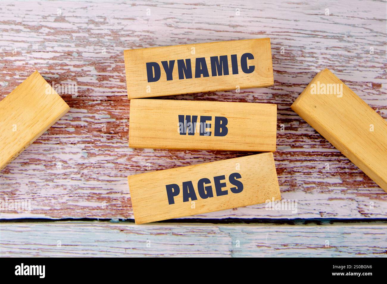 Colorful wooden blocks stacked together spell out dynamic web pages ... Colorful wooden blocks stacked together spell out dynamic web pages ...