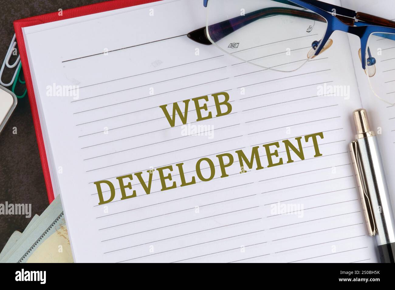 Concept word WEB DEVELOPMENT it is written in the business book in ...
