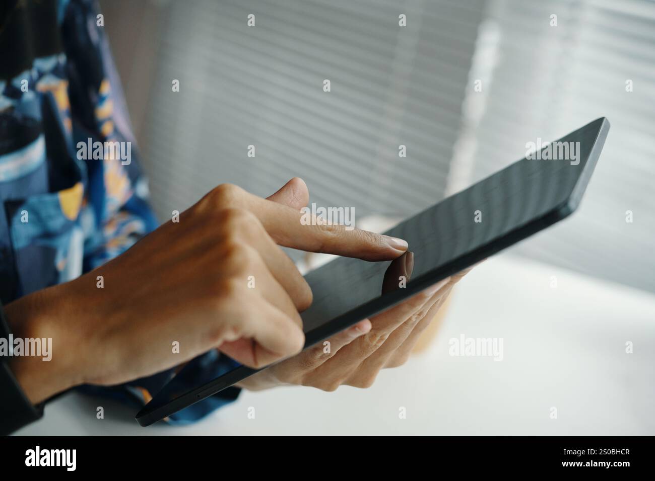 Tapping tablet hi-res stock photography and images - Alamy