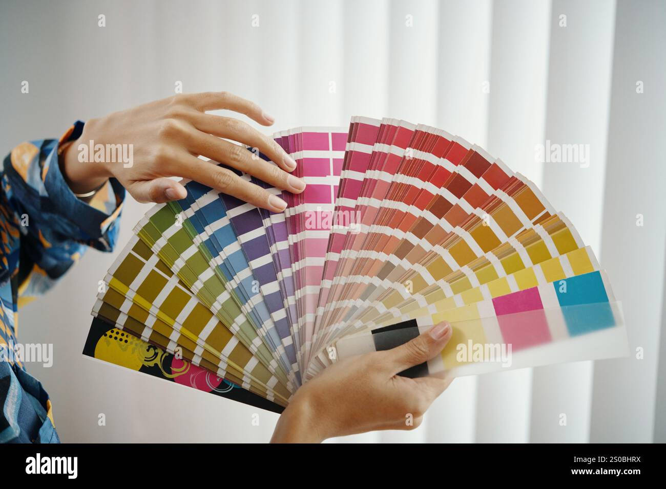 Unrecognizable Designer Demonstrating Color Palette Stock Photo - Alamy
