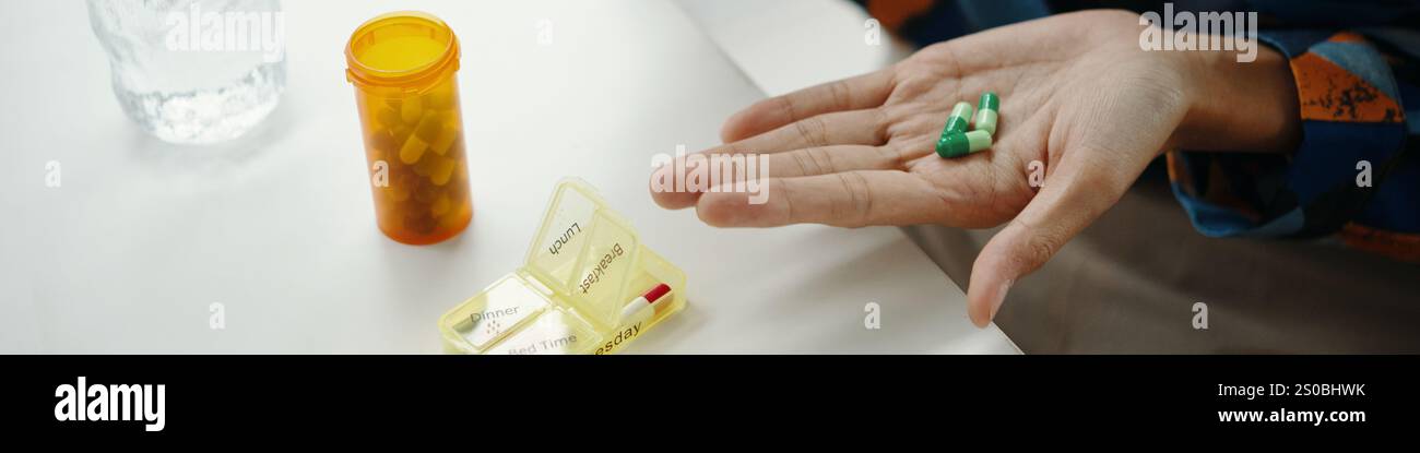 Unrecognizable Woman With Medications In Hand Header Stock Photo - Alamy