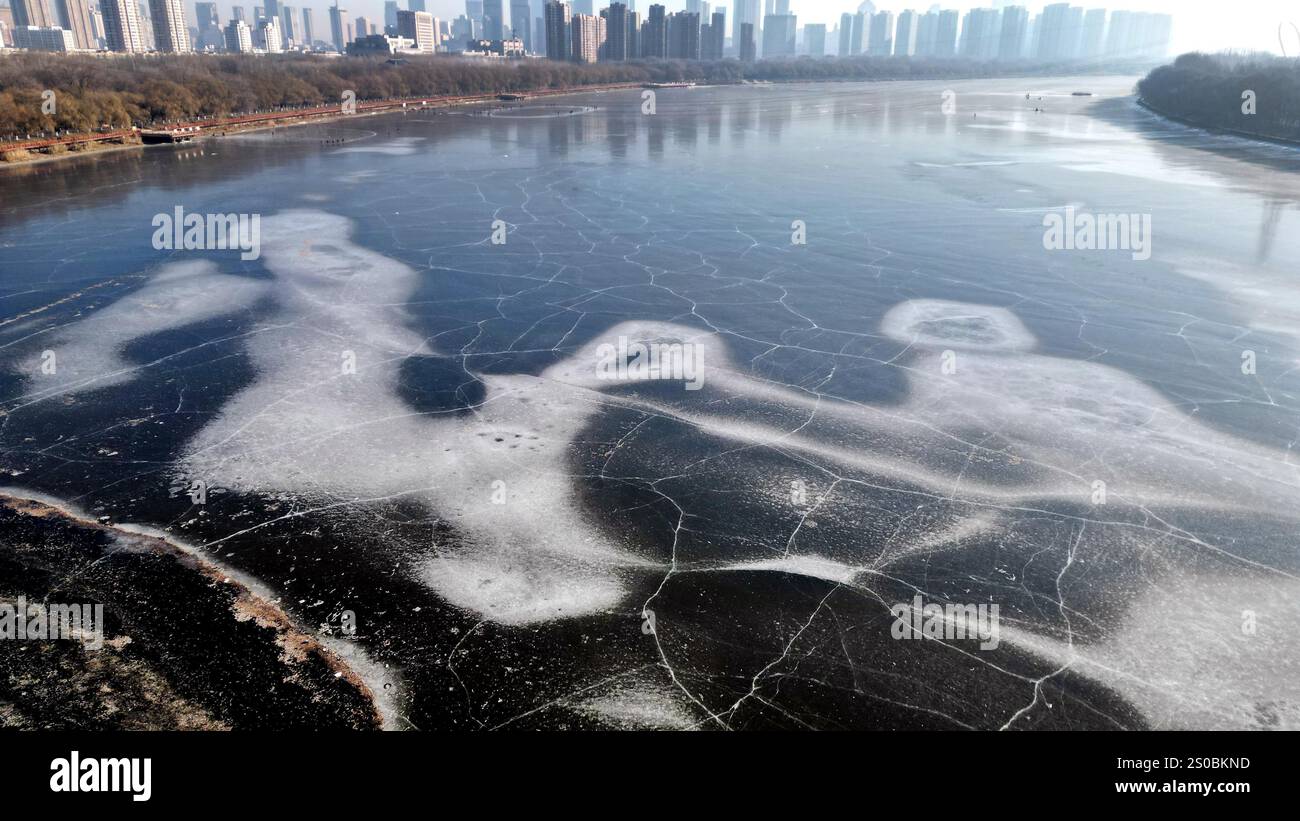Aerial photo shows the frozen Hun River in Shenyang City, northeast ...
