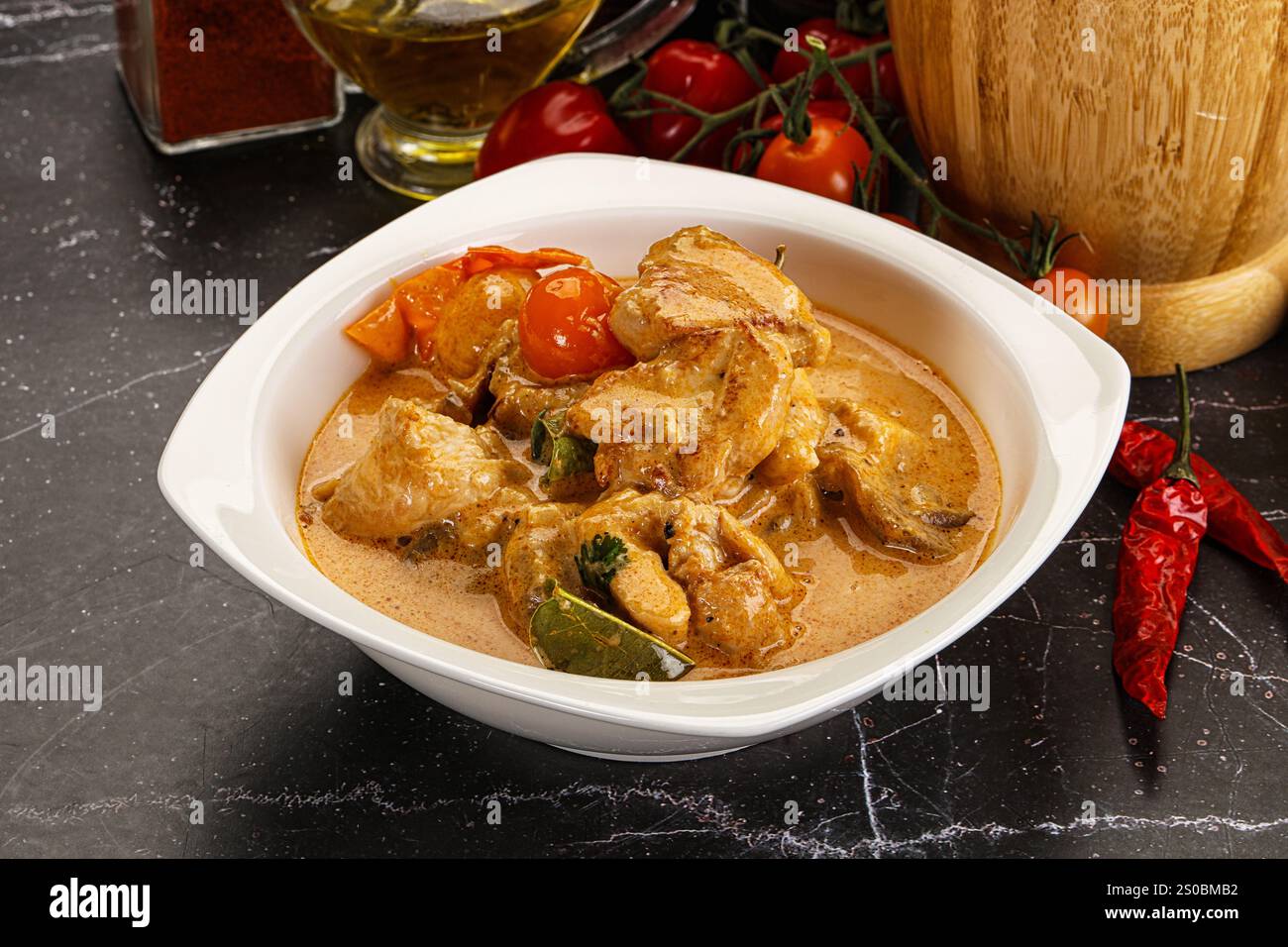Thai Tom yum spicy soup with chicken Stock Photo - Alamy