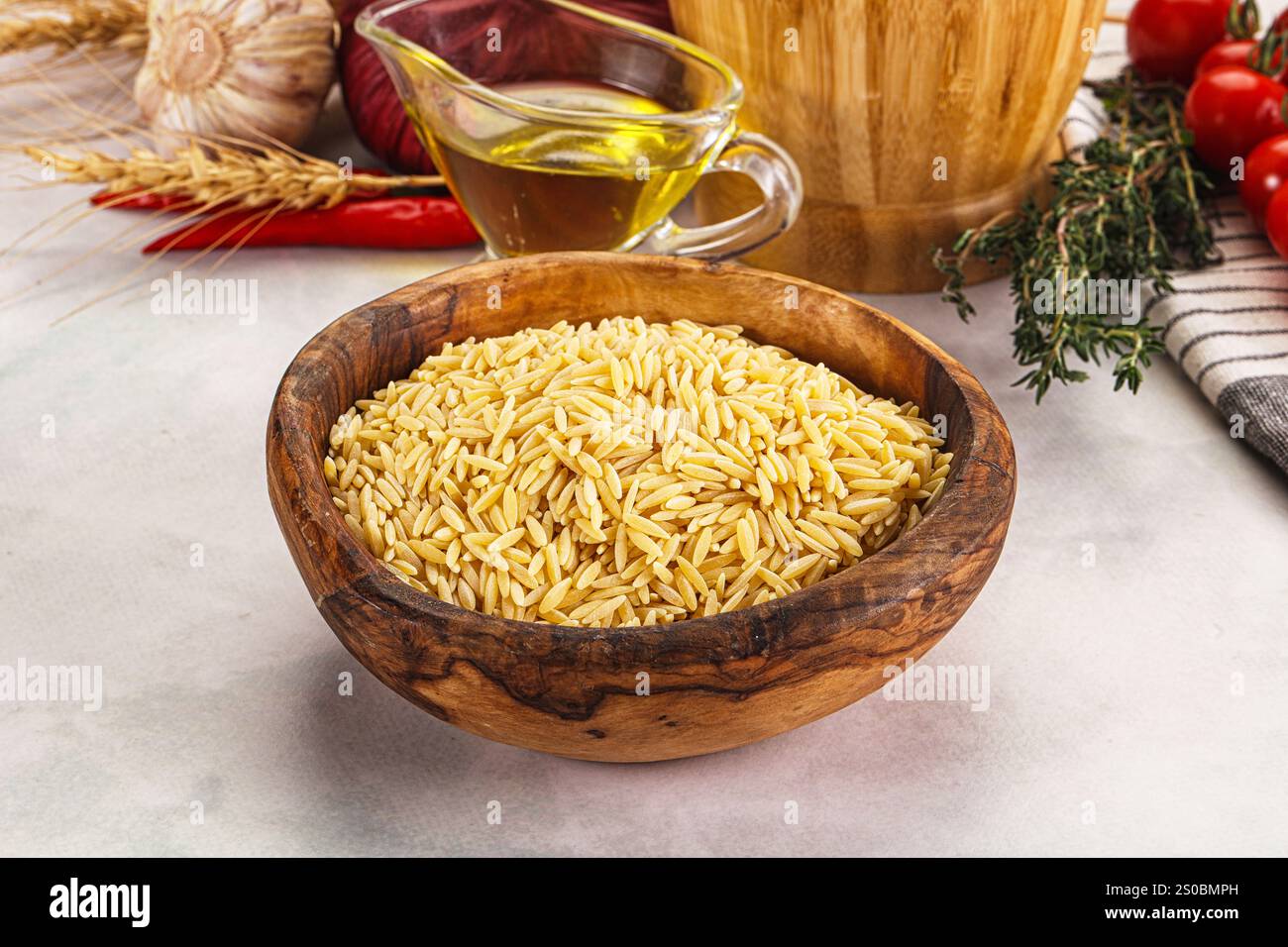 Italian raw dry pasta risoni for cooking Stock Photo - Alamy