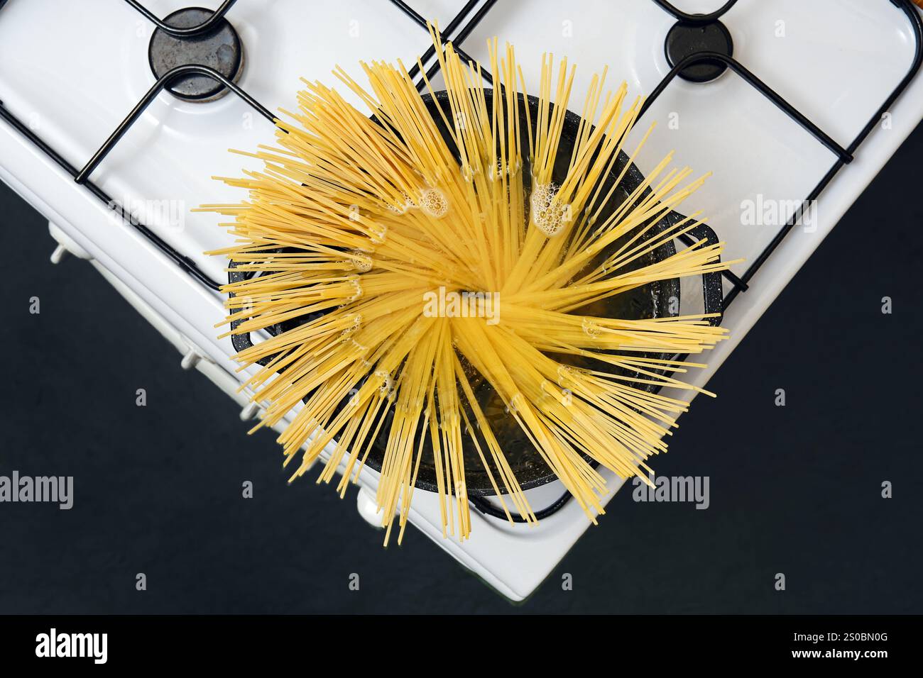 Spaghetti placed in boiling water hi-res stock photography and images ...