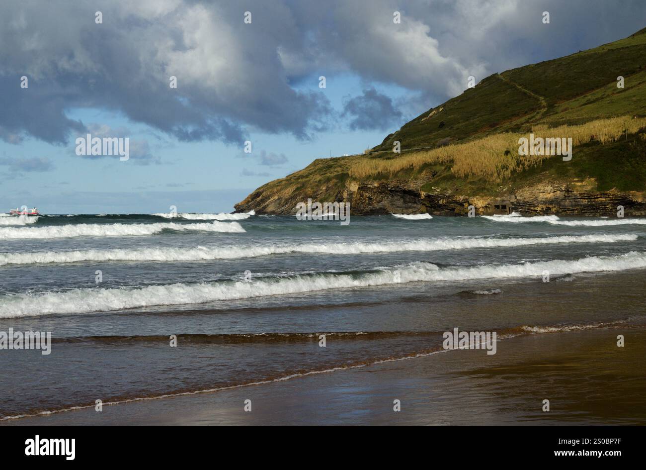Basque Country, dark sand beach Playa de La Arena Biscayan between ...