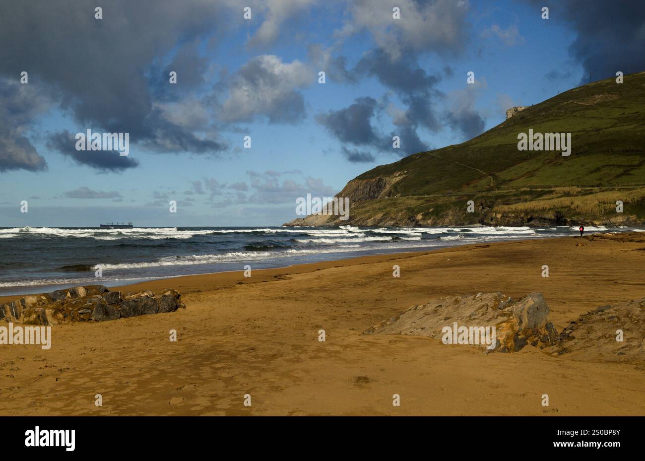 Basque Country, dark sand beach Playa de La Arena Biscayan between ...