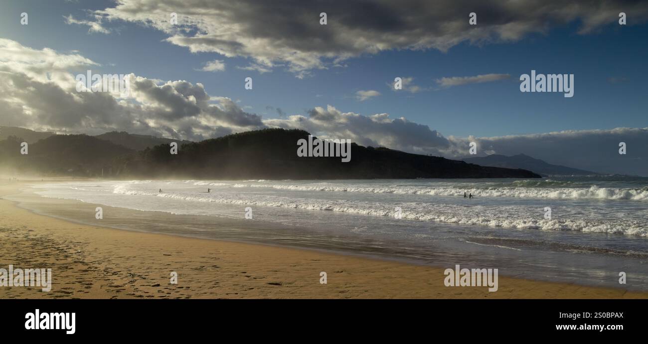 Basque Country, dark sand beach Playa de La Arena Biscayan between ...