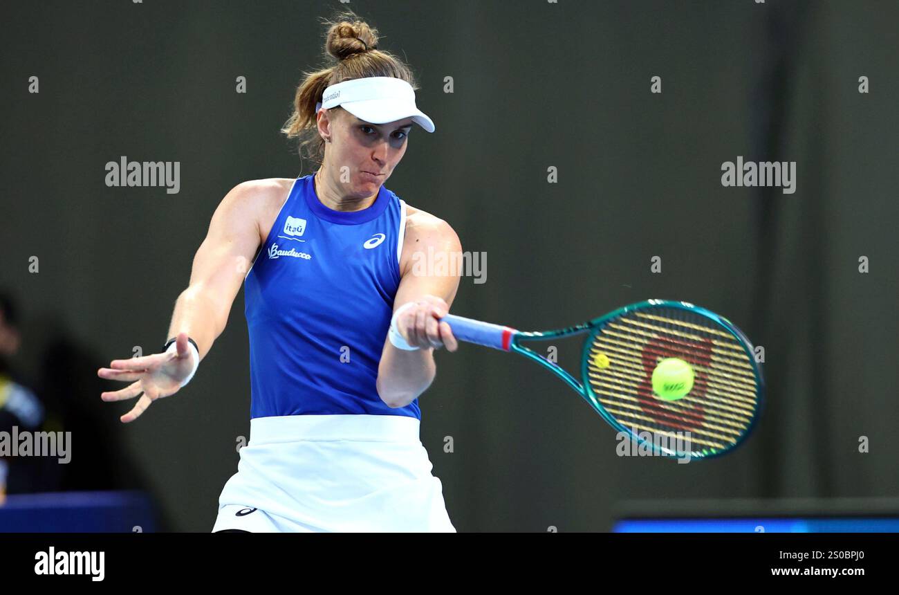 Beatriz Haddad Maia of Brazil plays a forehand shot to opponent Xinyu ...