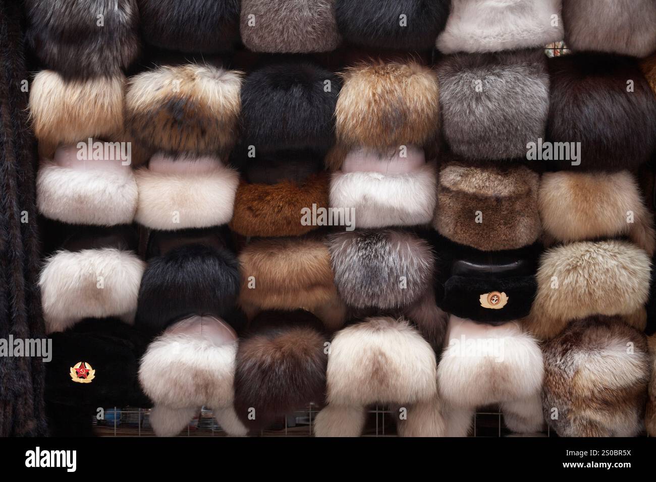 Russian fur hats, some with old Sovjetunion logos ect Stock Photo - Alamy