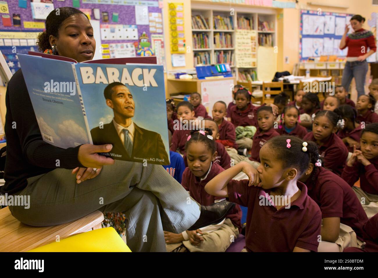 A school director on Chicago's south side reads to kindergarten and ...