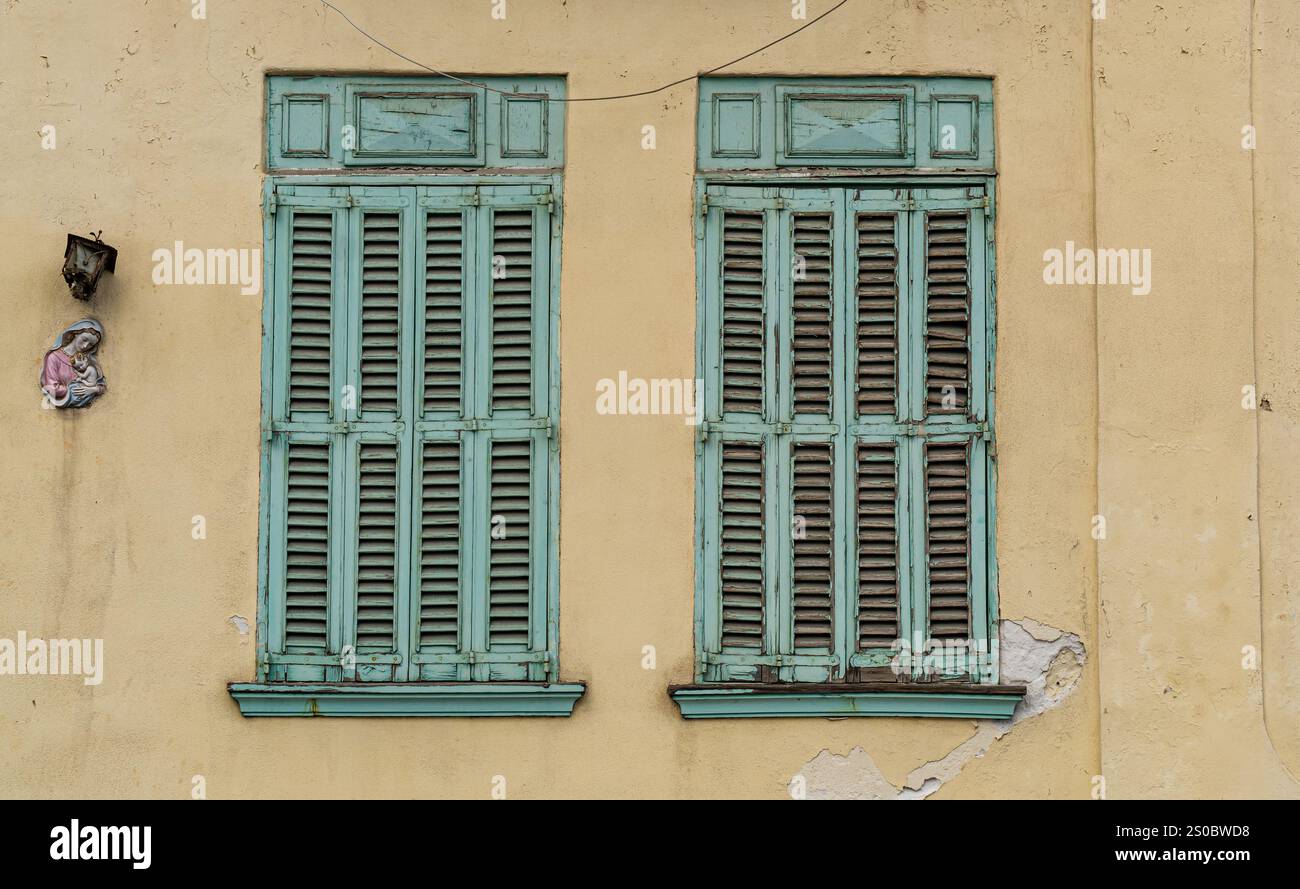 Traditional house detail in Malta. Limestone yellow bricks and colorful ...