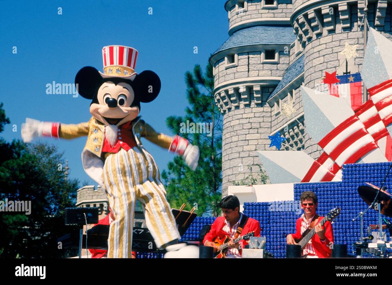 Mickey Mouse performing on stage at castle at Disney world in Orlando ...