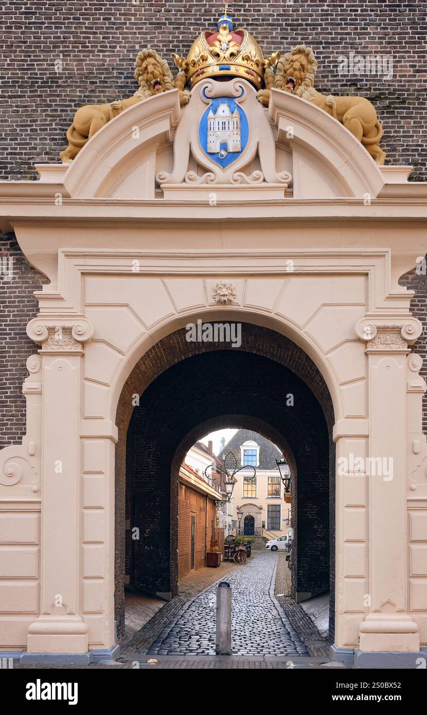 Rich decorated Gate under Nieuwe Toren Bell Tower in Kampen, with ...
