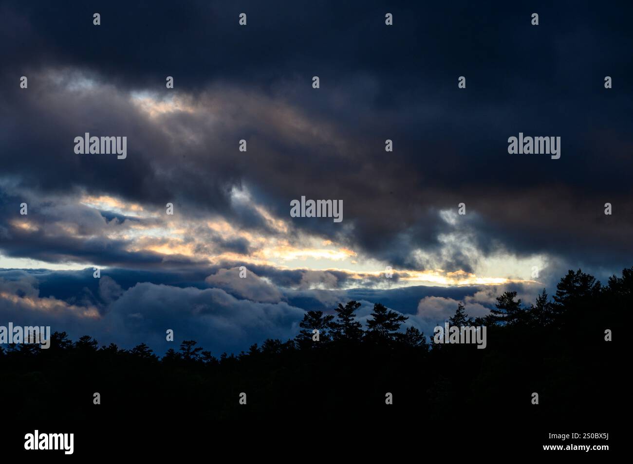 Dark clouds and sunset over Lake Winnipesaukee, New Hampshire Stock ...