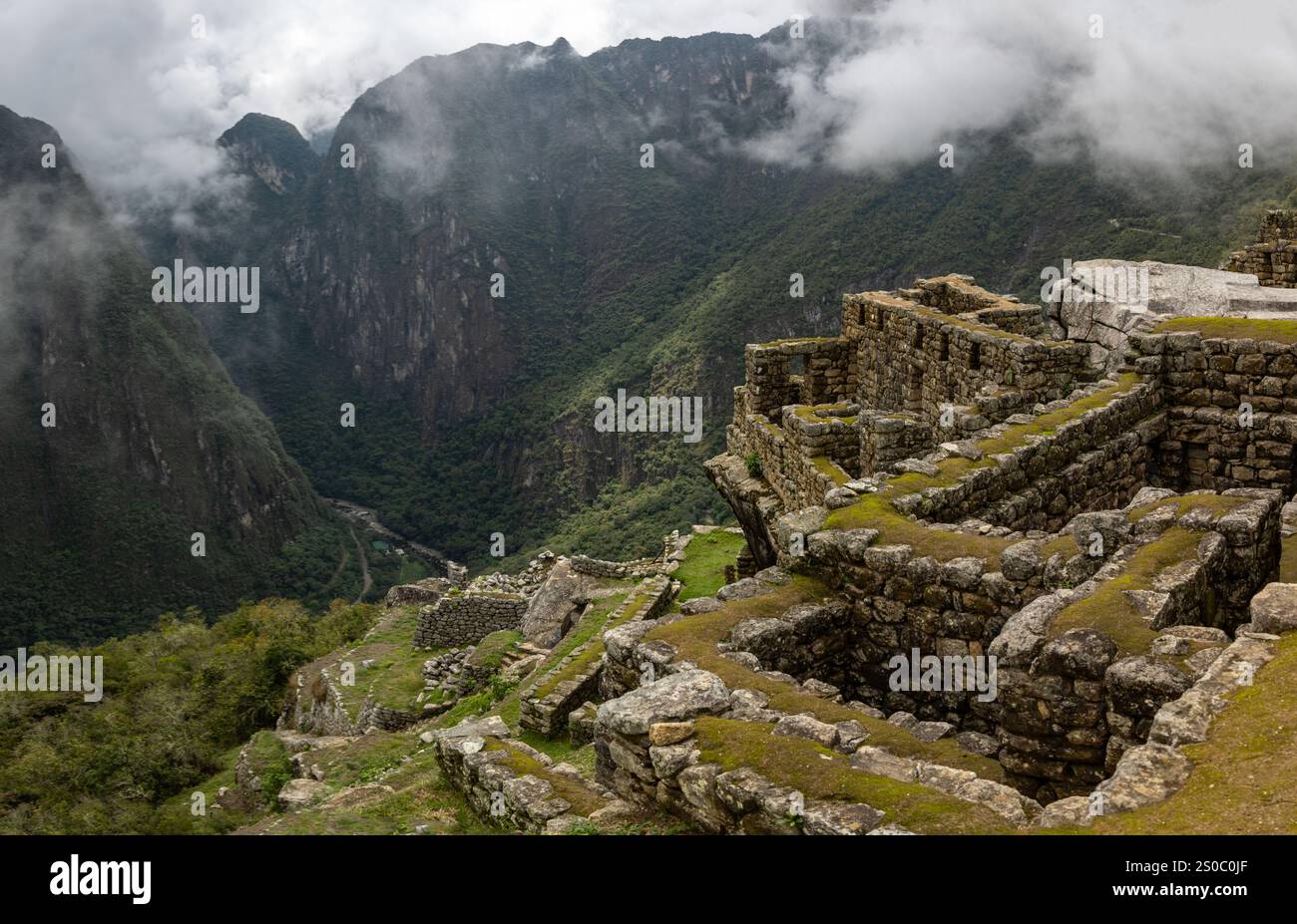 Machu Picchu ruins in Peru during a misty morning Stock Photo - Alamy
