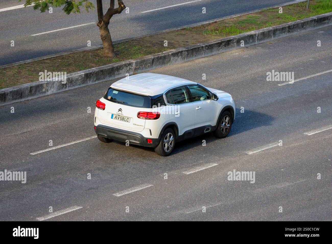 White citroen c5 aircross suv driving on an asphalt road Stock Photo ...