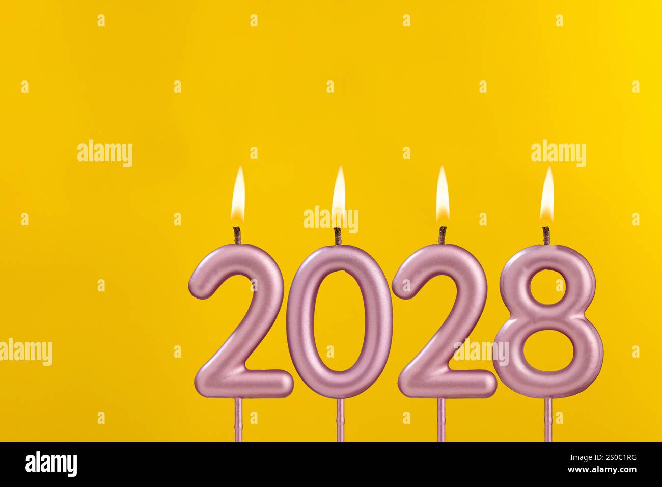 Happy New Year 2028 - Candles in the form of lit numbers Stock Photo ...