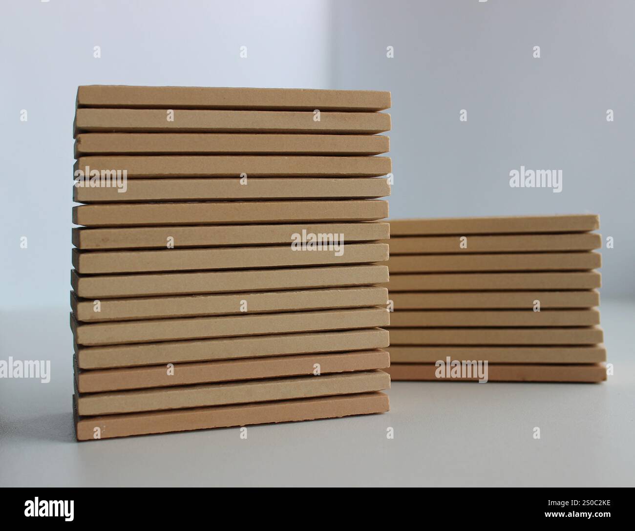 Two pallets of beige ceramic tiles isolated on white stock photo ...