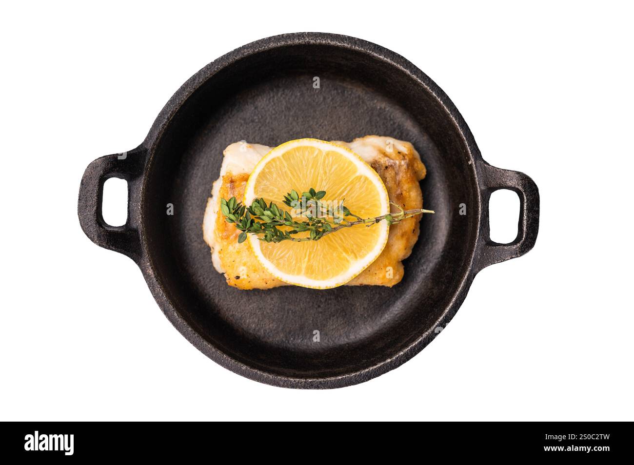 Roasted cod fish loin fiilet in skillet isolated on white background ...