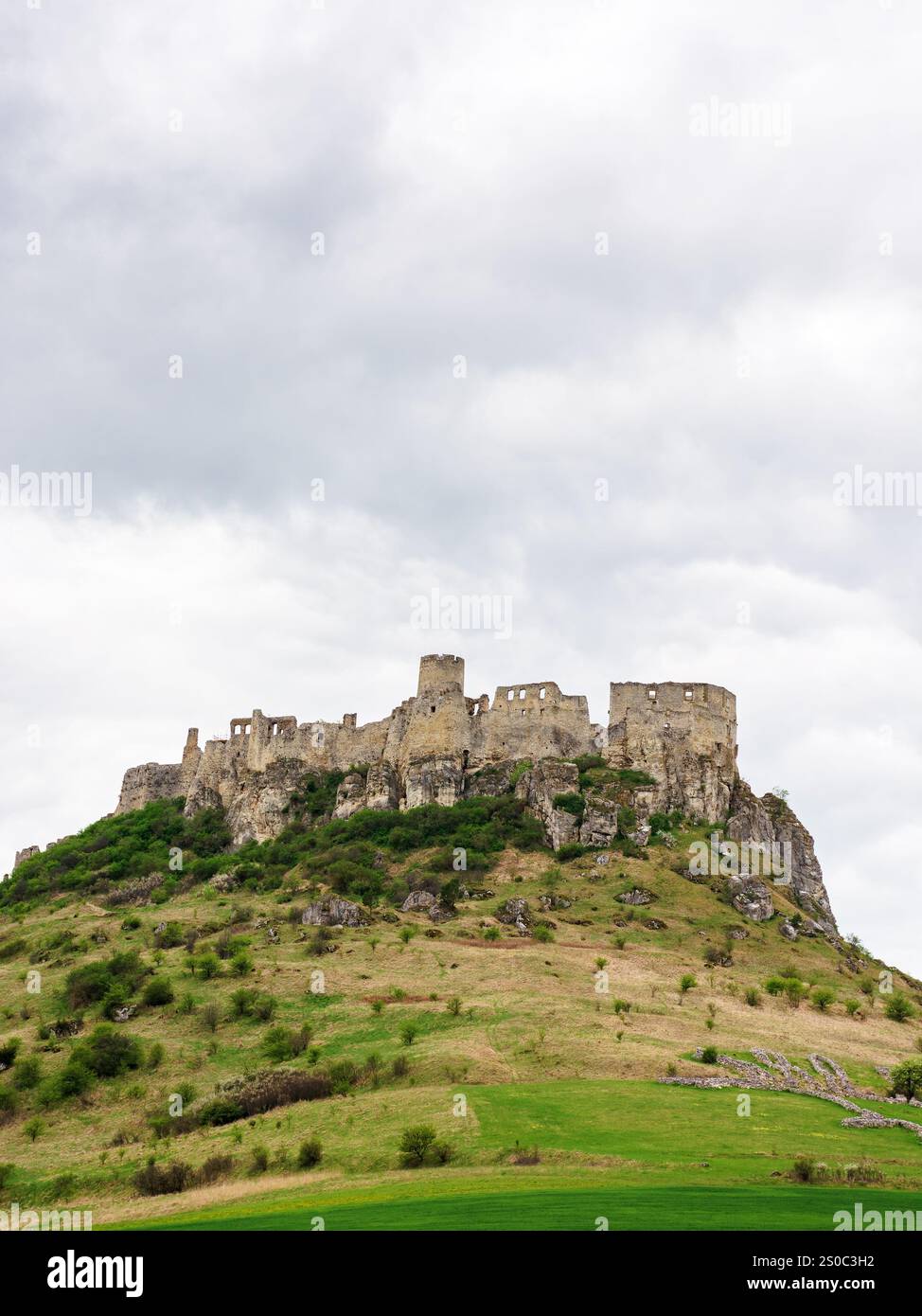 spis castle on the hill in spring. unesco world heritage site. popular ...