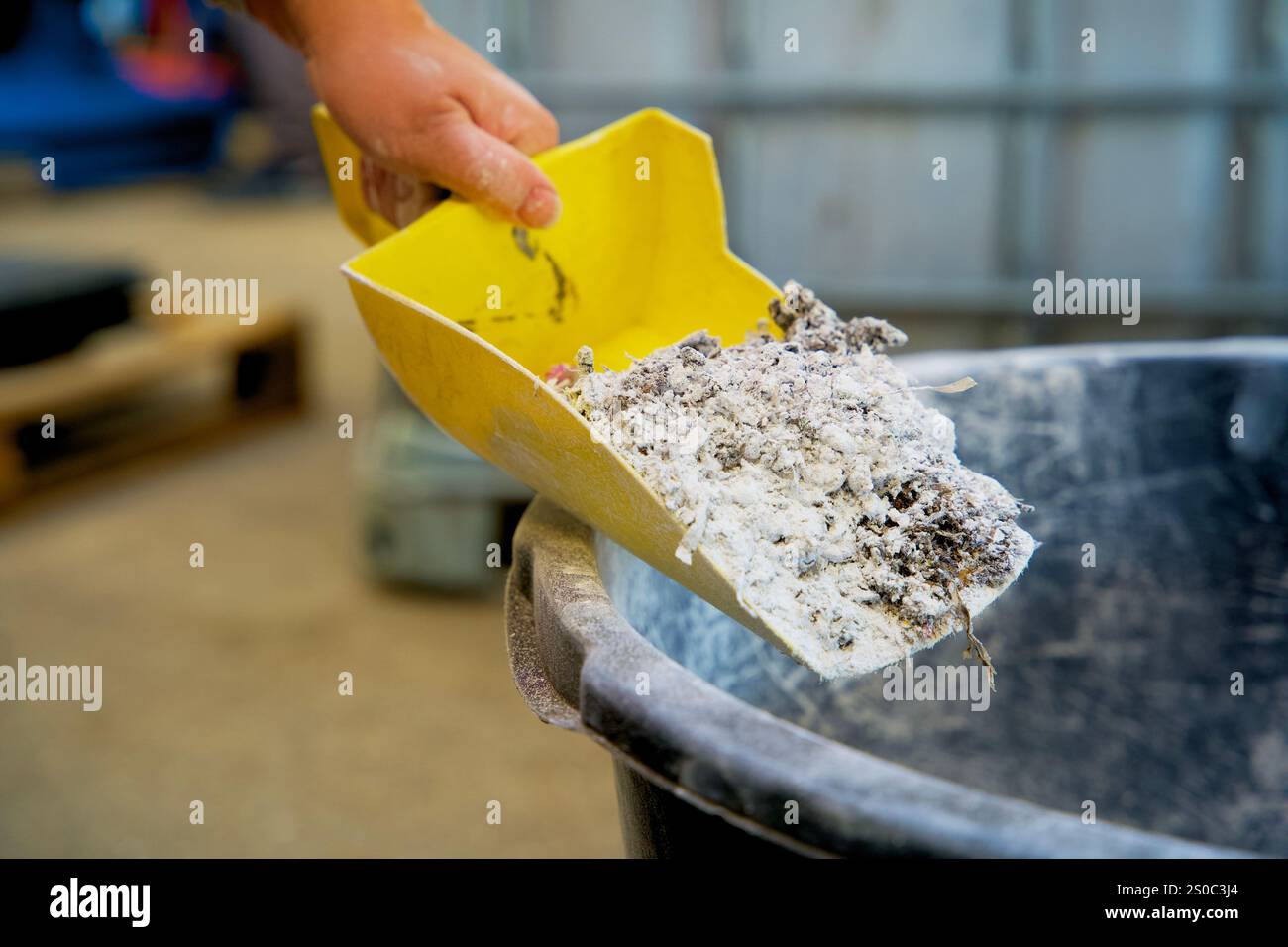 Stack of plastic residual mix waste in a plastic recycling factory ...
