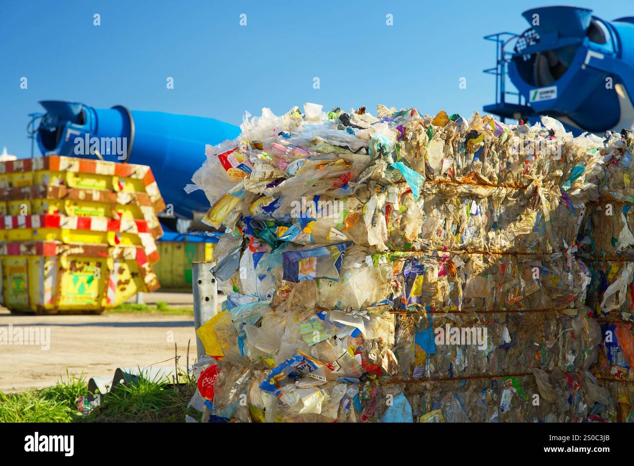 Stack of plastic residual mix waste in a plastic recycling factory ...