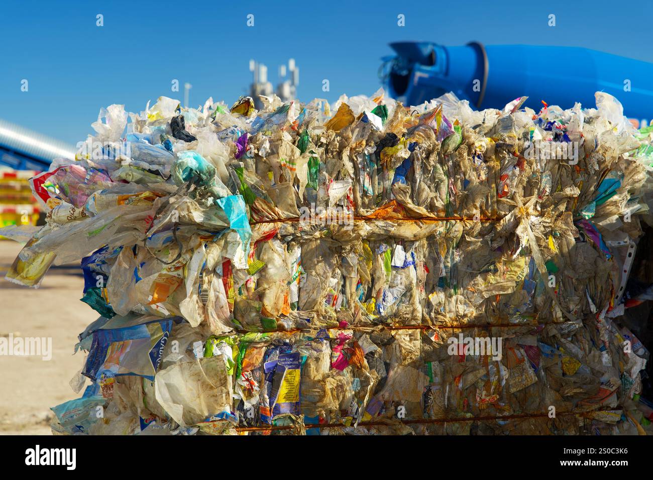 Stack of plastic residual mix waste in a plastic recycling factory ...