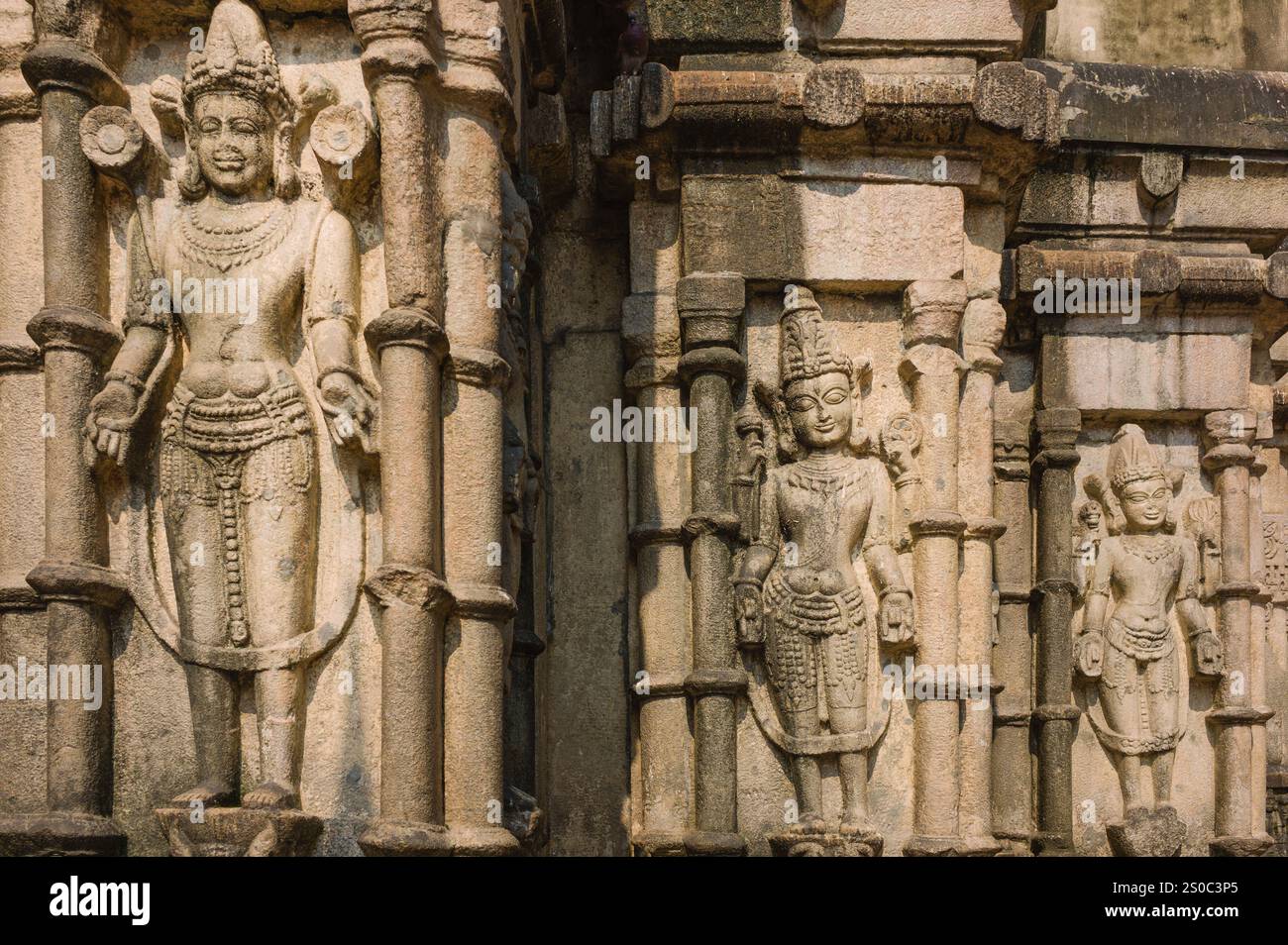 Hindu stone sculptures on the outside elevation of the ancient Kamakhya ...