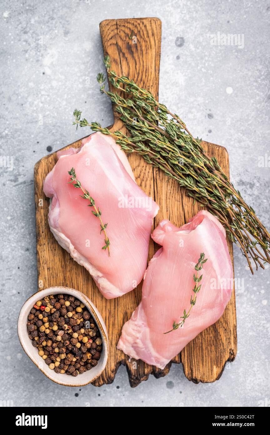 Chicken thigh fillet, raw Skinless boneless poultry meat. grey ...
