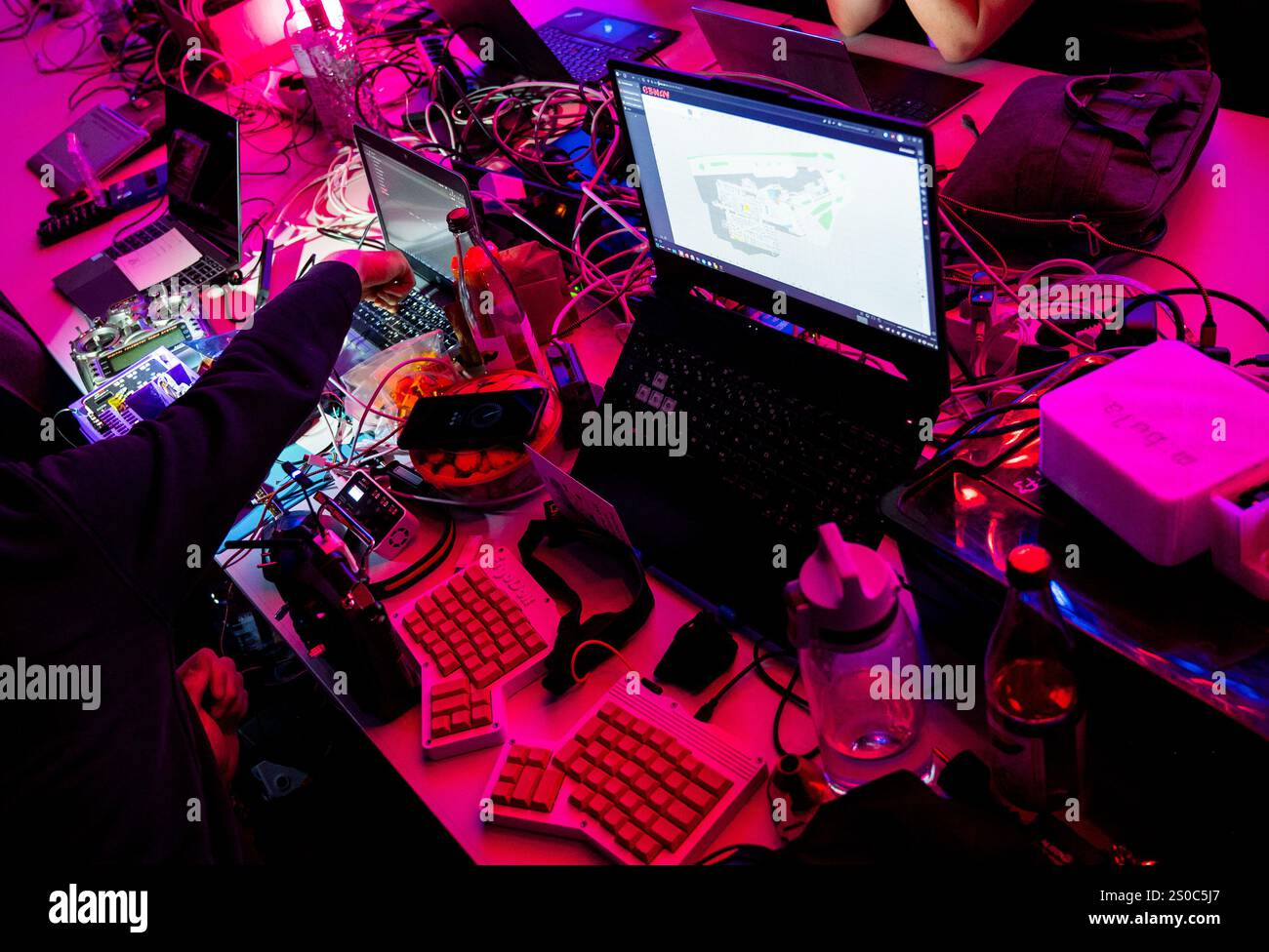 27 December 2024, Hamburg: Computers stand on a table at the Chaos ...