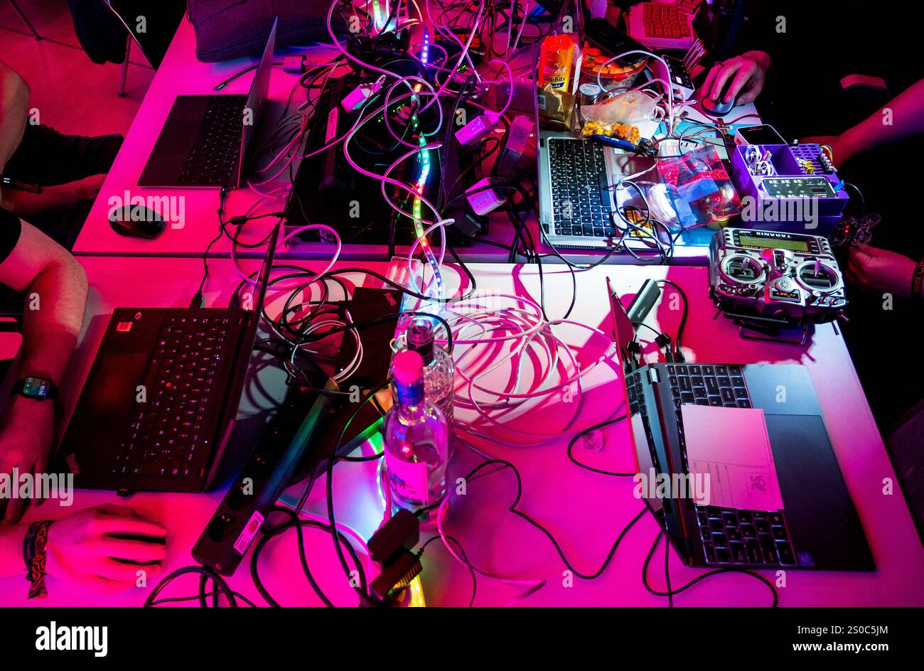 Hamburg, Germany. 27th Dec, 2024. Computers stand on a table at the Chaos Computer Club (CCC ...