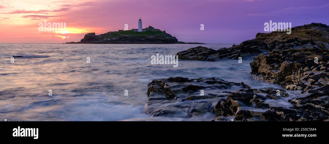 St Ives, UK - July15, 2024: Sunset on Godrevy Island Lighthouse ...
