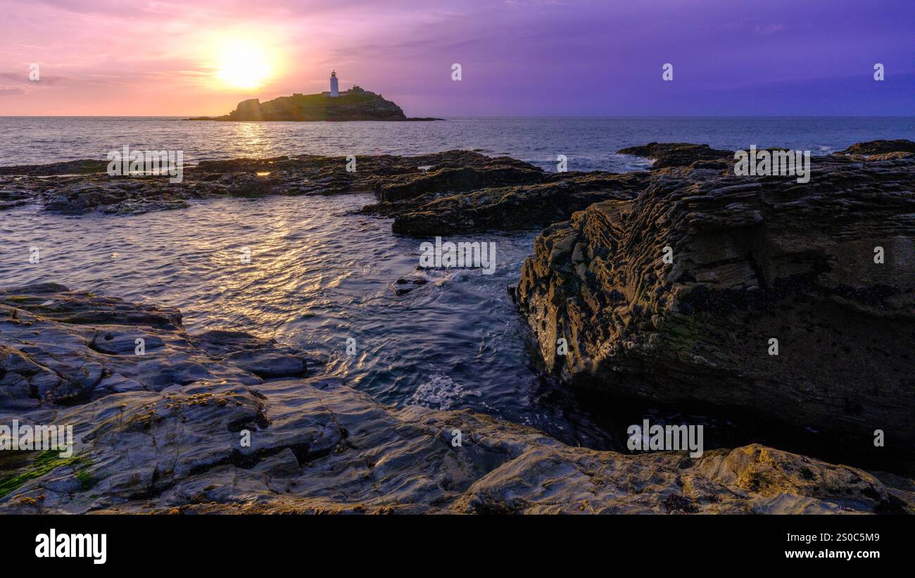 St Ives, UK - July15, 2024: Sunset on Godrevy Island Lighthouse ...
