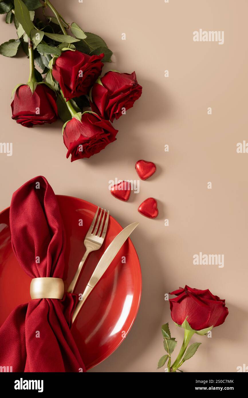 Valentine's day. Romantic dinner for date with red plate, chocolate sweets, romantic gift and ...