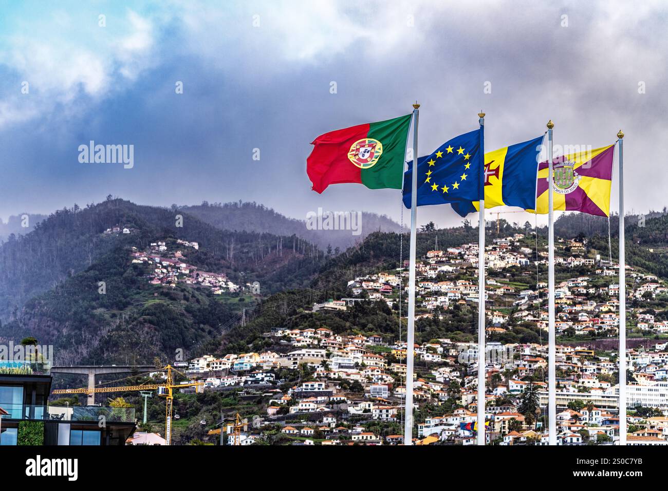 Flags of Portugal, the European Union, and Madeira displayed with a ...