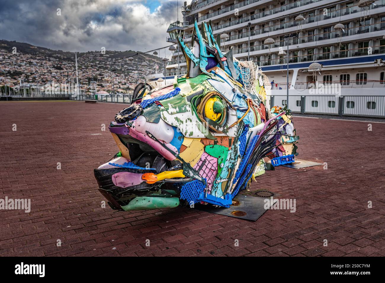 Ecological art installation of a vibrant fish made of recycled ...