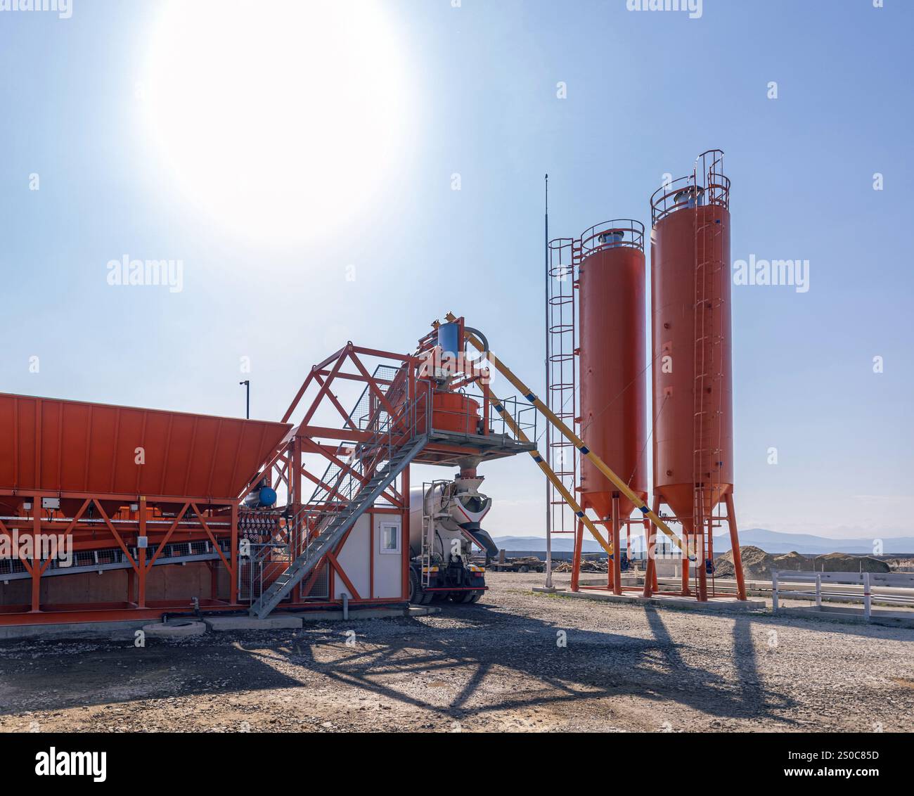 Concrete batching plant preparing concrete for a construction project ...