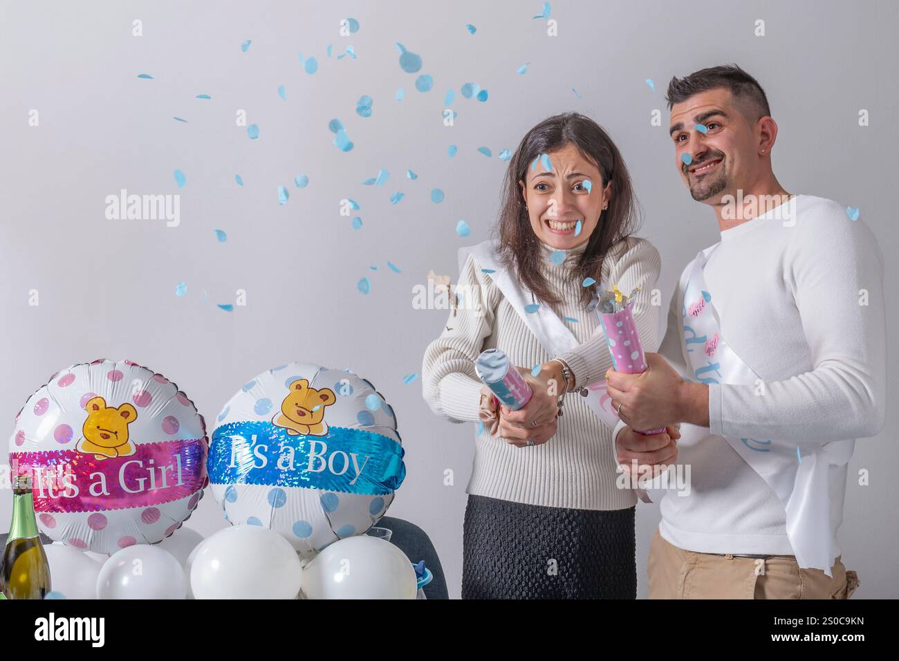 A young couple reveals the gender of their unborn child by shooting ...