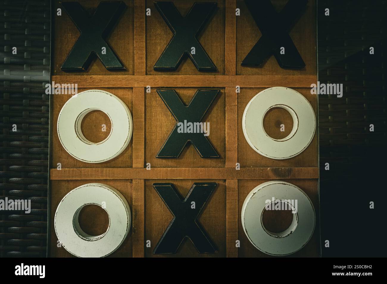 Wooden tic tac toe game board close up Stock Photo - Alamy
