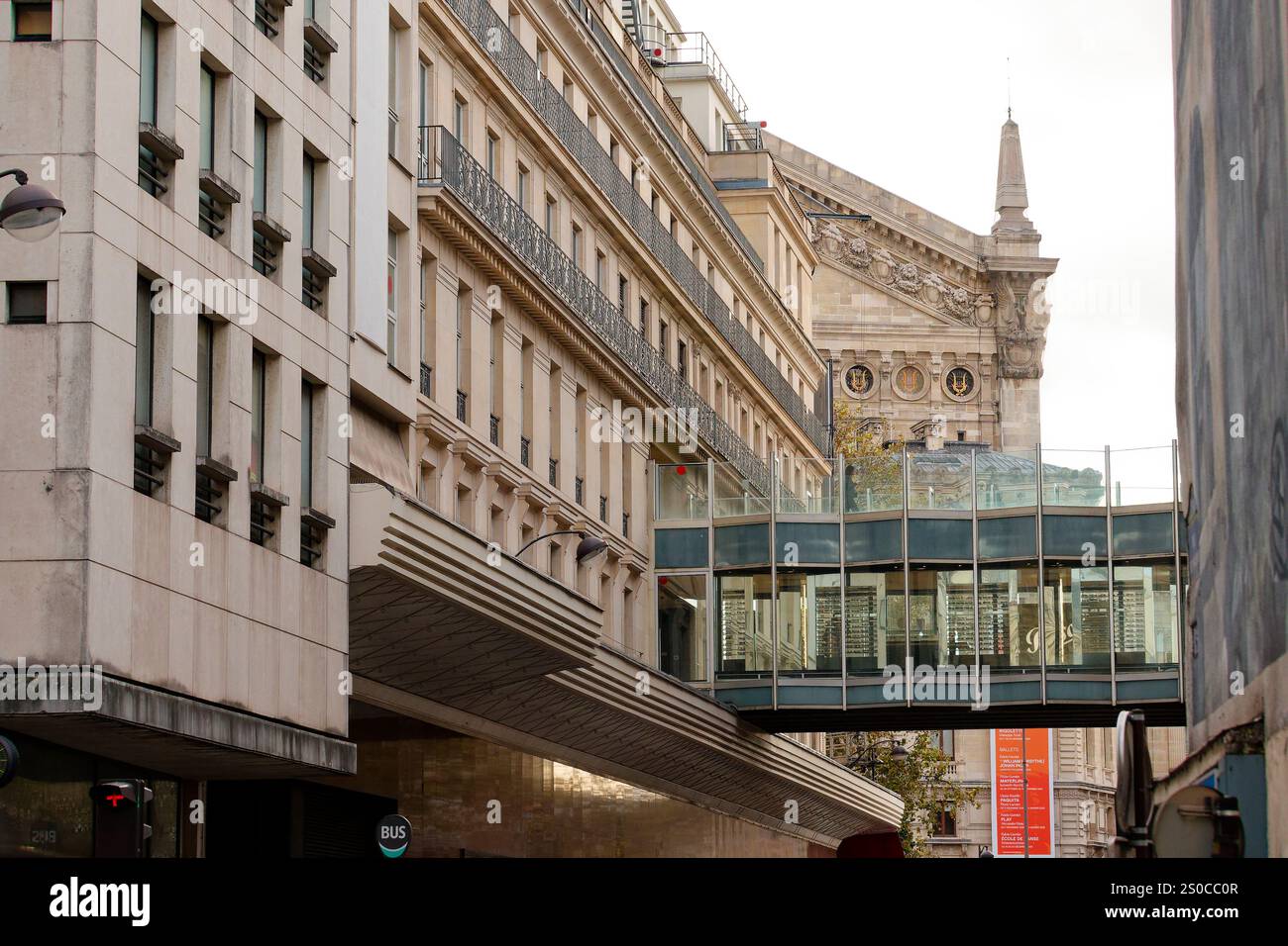 Urban architecture showcases modern glass bridge connecting historic ...