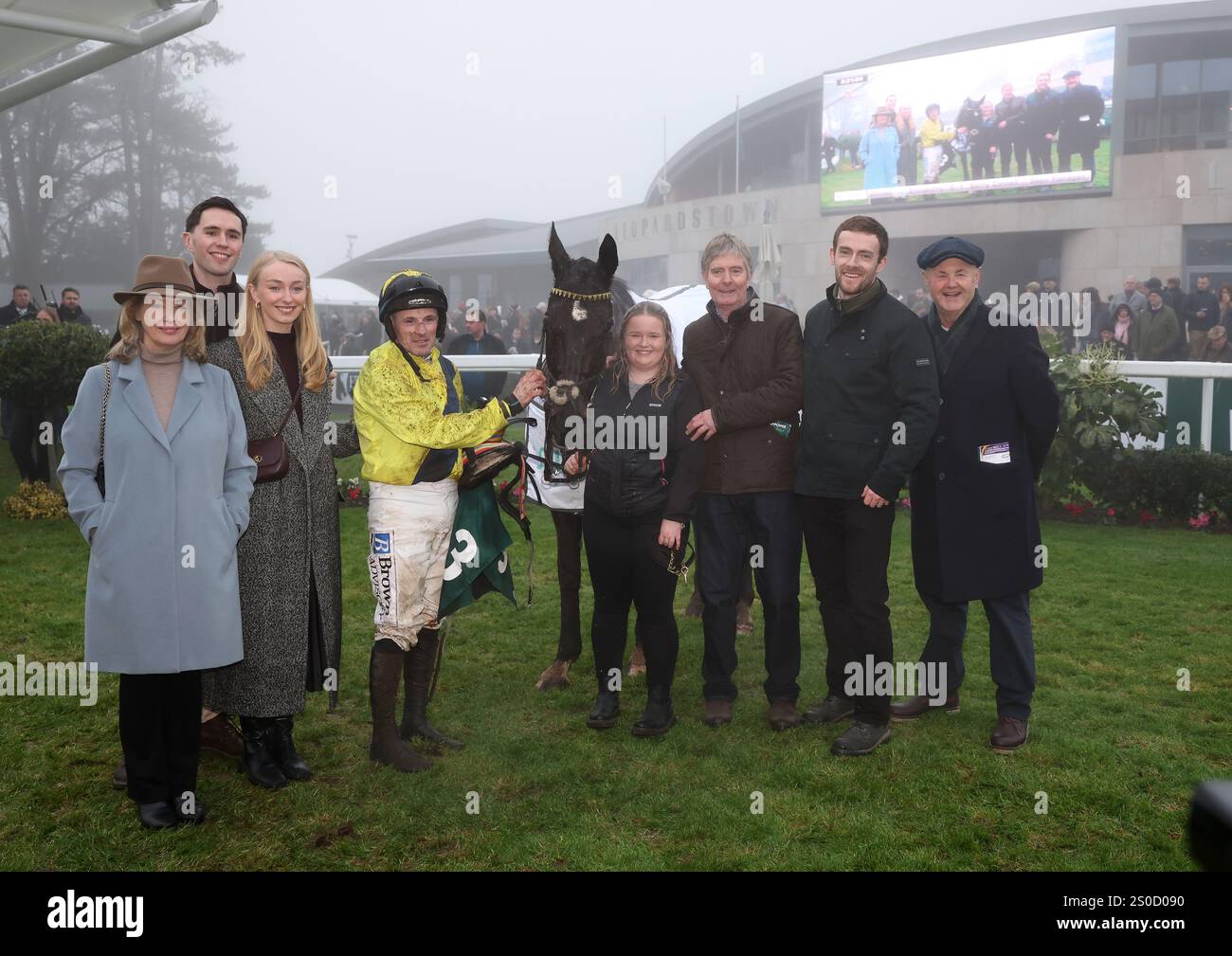 Enniskerry Ridden by Jockey Sean Flanagan (Fourth left) and Trainer ...