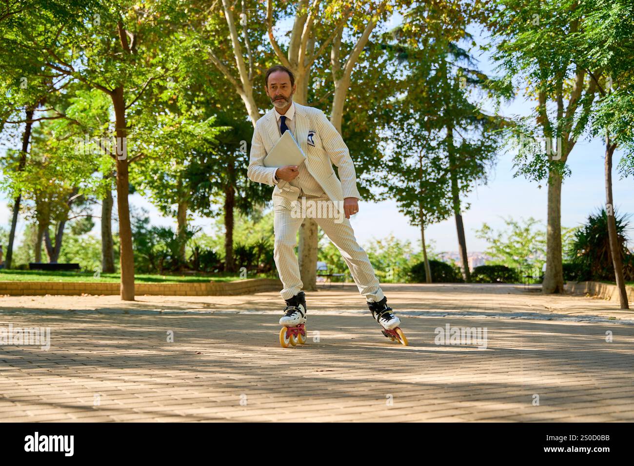 Cheerful man in roller hi-res stock photography and images - Alamy