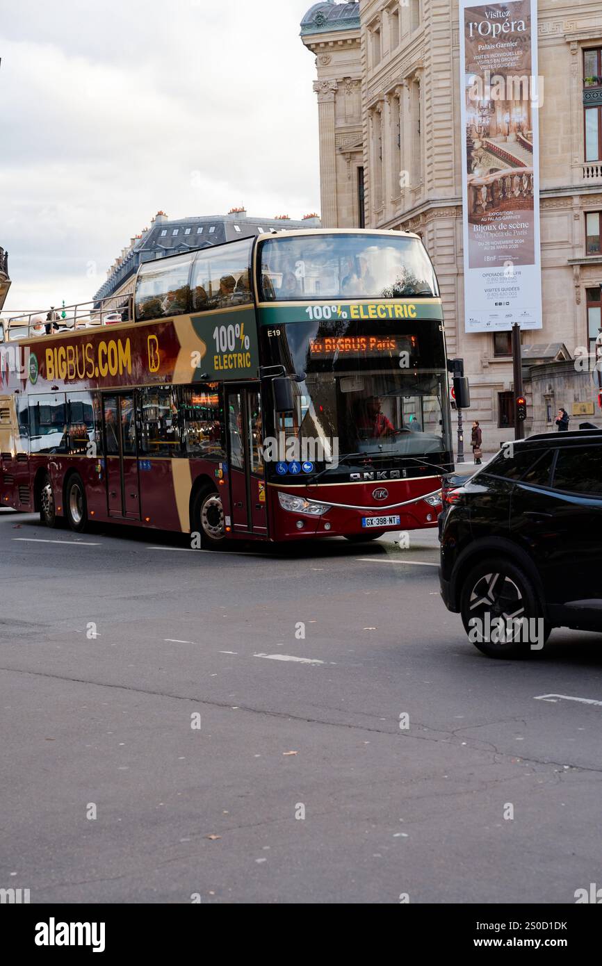 Electric double-decker bus waiting at a city stop in Paris near ...