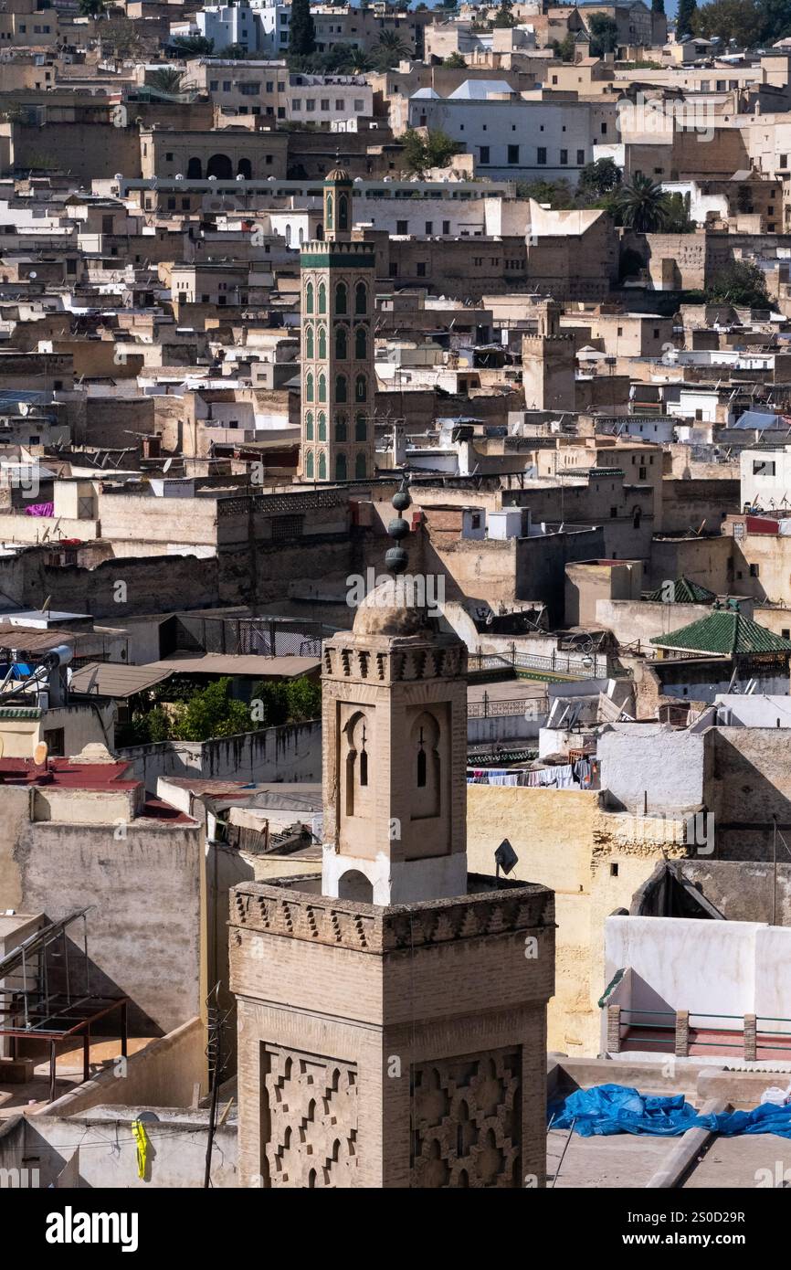 Landscape of the medina in Fes with mosque minaret in Morocco on 2 ...