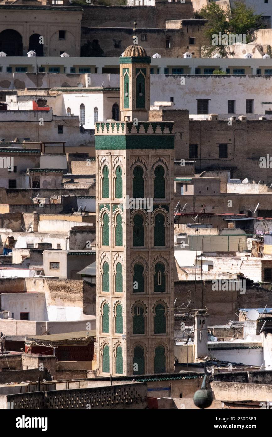 Landscape of the medina in Fes with mosque minaret in Morocco on 2 ...