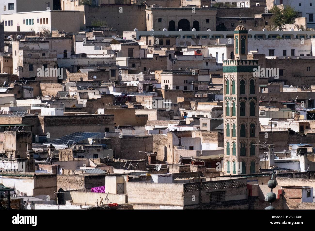 Landscape of the medina in Fes with mosque minaret in Morocco on 2 ...