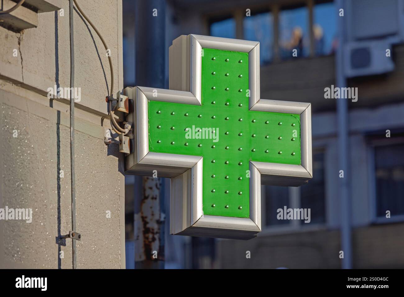 Green Cross Sign Led Lights in Silver Frame Stock Photo - Alamy