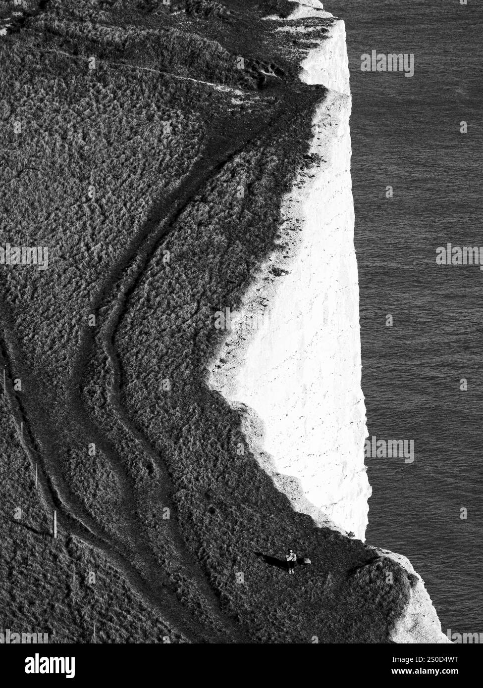 Dramatic Black and White Landscape, Man Sitting on the Edge of the ...